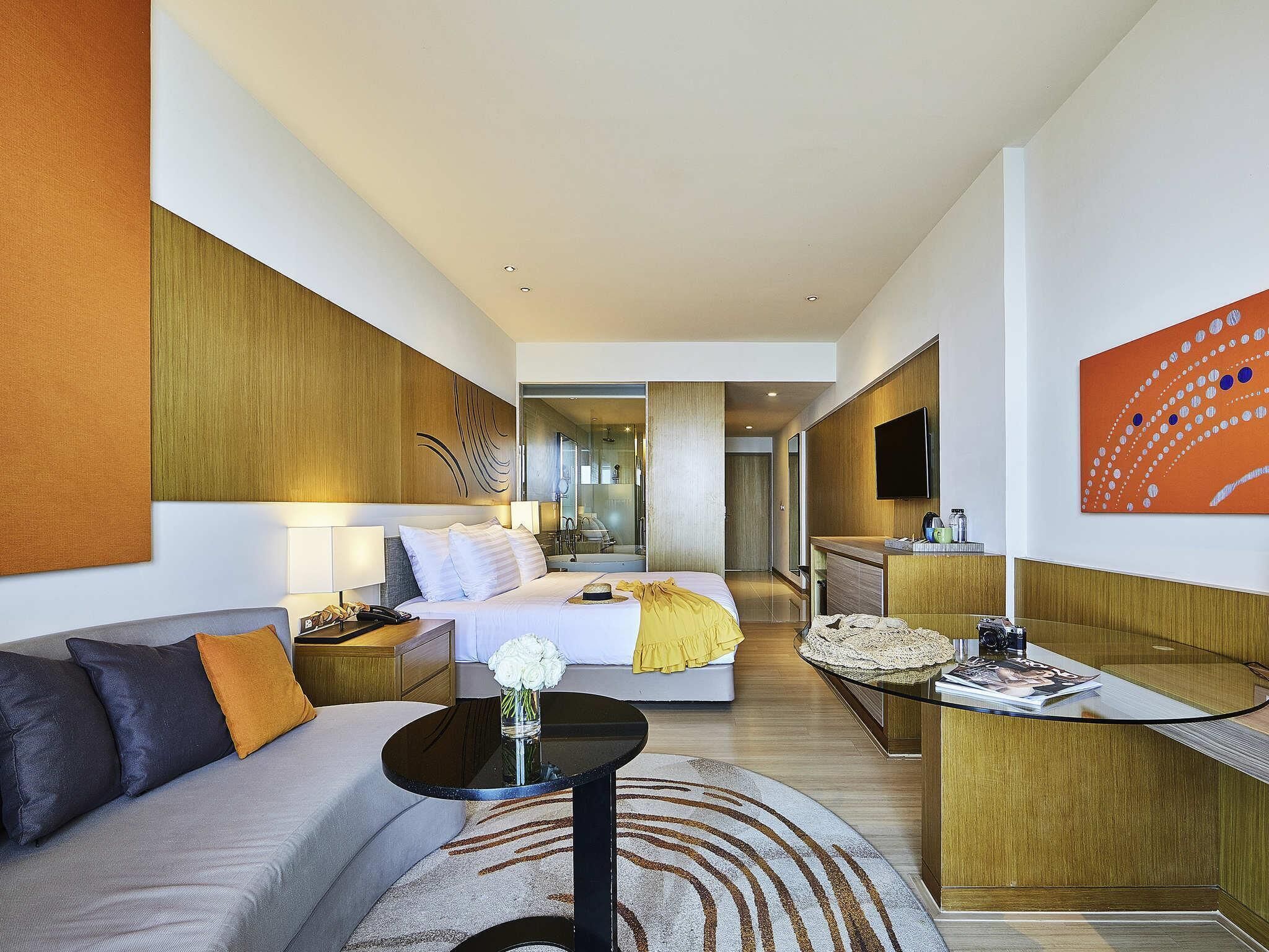 Quarto Deluxe, 1 cama king-size, vista para o mar | Lençóis de algodão egípcio, roupa de alta qualidade, minibar 