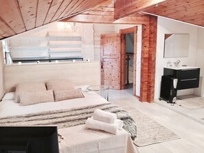 Estúdio luxo | Roupas de cama premium, edredons de pluma, individualmente decorados