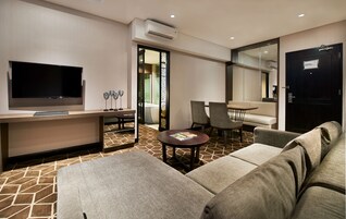 Suíte premier | Roupas de cama premium, frigobar, cofres nos quartos, escrivaninha