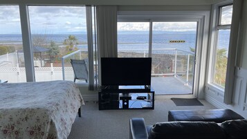 Suíte premier, 1 cama Queen | Edredons de pluma, escrivaninha, Wi-Fi de cortesia, roupa de cama