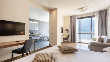 Suite Panorâmica, vista para o lago | 1 quarto, cofre no quarto, secretária, Wi-fi grátis