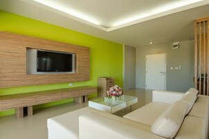 Suíte | Área de estar | TV de tela plana