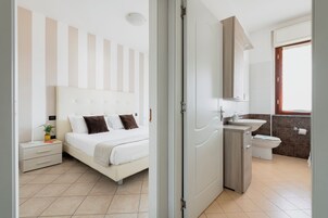 Apartamento Deluxe, 1 quarto, terraço | Roupa hipoalergénica, camas de colchão Select Comfort, secretária