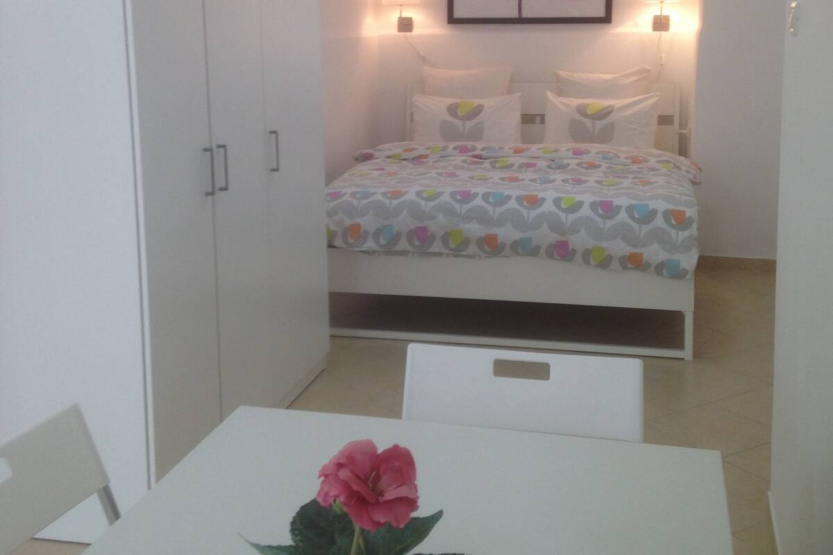 Suíte estúdio conforto, vista para a cidade | Roupas de cama premium, escrivaninha, Wi-Fi de cortesia