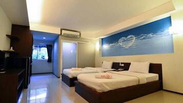 Standard King Room | Escrivaninha, cortinas blackout, Wi-Fi de cortesia, roupa de cama