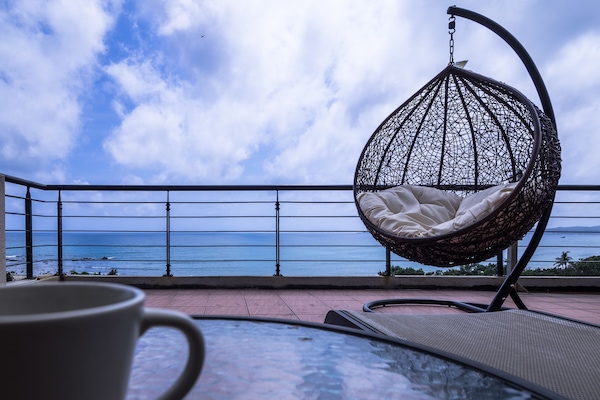 Quarto Duplo Panorâmico, vista para o oceano | Varanda