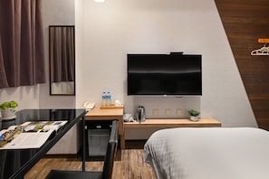 Quarto Twin Deluxe | Edredões de penas, cortinas/cortinados opacos, Wi-fi grátis 
