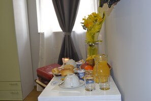 Quarto família | Serviço de quarto: opções para refeição