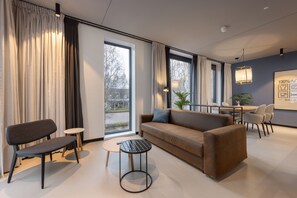 Loft Cidade | Sala de estar | TV de ecrã plano 