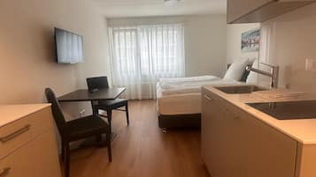 Apartamento, para não fumantes | Ferros/tábuas de passar roupa, Wi-Fi de cortesia, roupa de cama