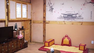 Quarto Familiar | Sala de estar | TV de ecrã plano