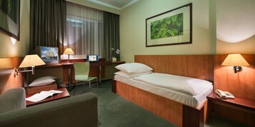 Quarto solteiro conforto, 1 cama de solteiro, vista para a cidade | Frigobar, cofres nos quartos, escrivaninha, quartos à prova de som