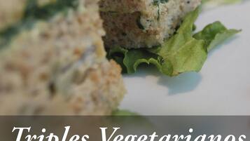 Um sanduíche com o texto "Triples Vegetarianos" e "Maresta Lodge" visível.