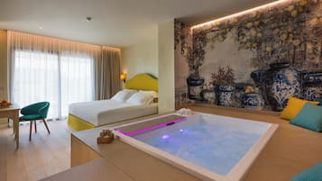 Suite Romântica | Roupa de alta qualidade, minibar, cofre no quarto, Wi-fi grátis