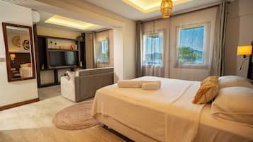 Suíte estúdio júnior, vista para o mar | Roupas de cama premium, camas Select Comfort, frigobar