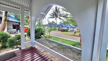 Quarto superior, vista para o jardim | Terraço/pátio
