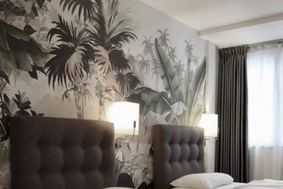 Economy Twin Room | Cofre no quarto, secretária, quartos insonorizados, Wi-fi grátis