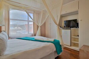 Quarto casal ou duplo família, 2 quartos | Individualmente decorados, individualmente mobiliados