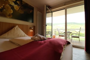 Quarto Duplo Deluxe para 1 Pessoa, banheira de hidromassagem (Balcony) | Roupa hipoalergénica, minibar, cofre com capacidade para portátil