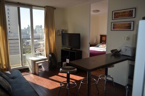 Apartamento | Sala de estar | Smart TV de 42 polegadas com canais digitais 