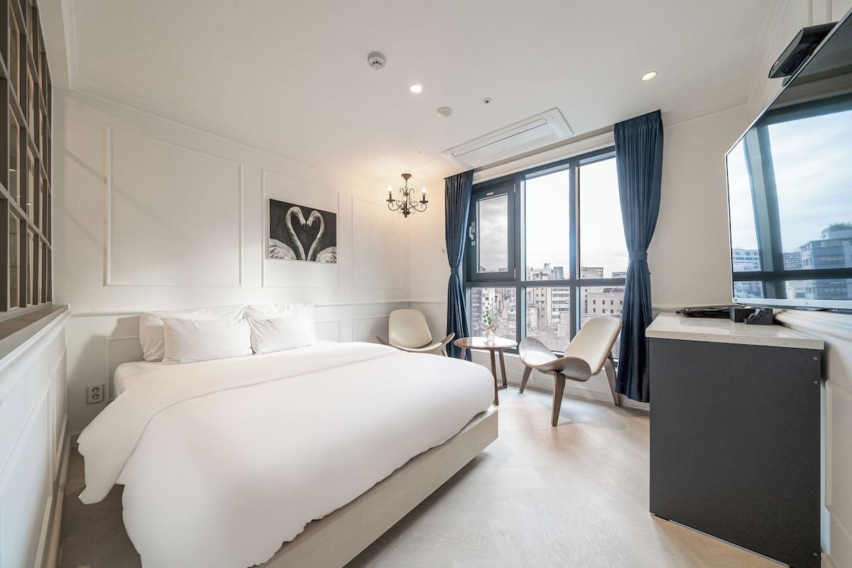 Quarto casal luxo | Vista para a cidade