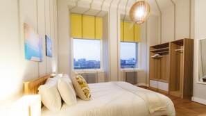 Apartamento Cidade, 3 quartos, Vista para a cidade | 3 quartos, roupa de alta qualidade, ferro/tábua de engomar 