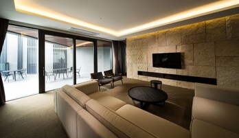 Suite (B) | Sala de estar | Televisor LCD de 50 polegadas com canais por cabo, televisor 