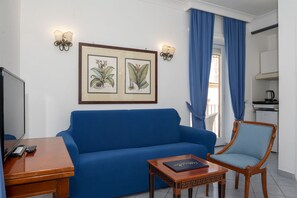 Apartamento, 1 quarto | Roupa de alta qualidade, minibar, cofre no quarto, secretária 