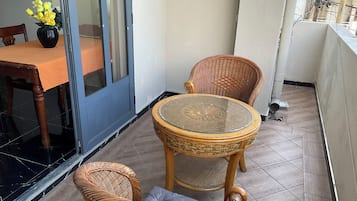 Quarto luxo, 1 cama King, vista para o resort | Terraço/pátio