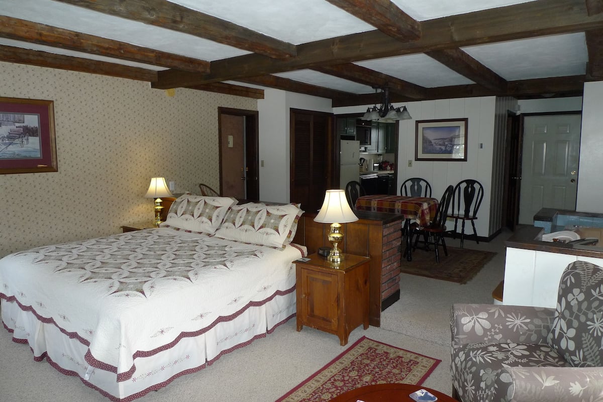 Quarto lua de mel, 1 cama King | Berços (sobretaxa), camas extras/dobráveis (sobretaxa)