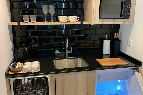 Quarto casal superior | Cozinha privada | Micro-ondas em uma área comum