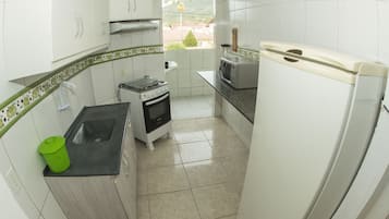 Apartamento família, 2 quartos, vista para a cidade, no jardim | Cozinha privada