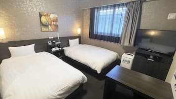 Quarto Twin, não fumadores | Secretária, Wi-fi grátis, roupa de cama fornecida