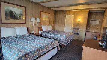 Quarto standard, 2 camas Queen | Wi-Fi de cortesia, roupa de cama