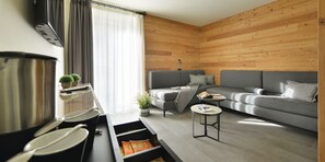 Suíte | Área de estar | TV de tela plana