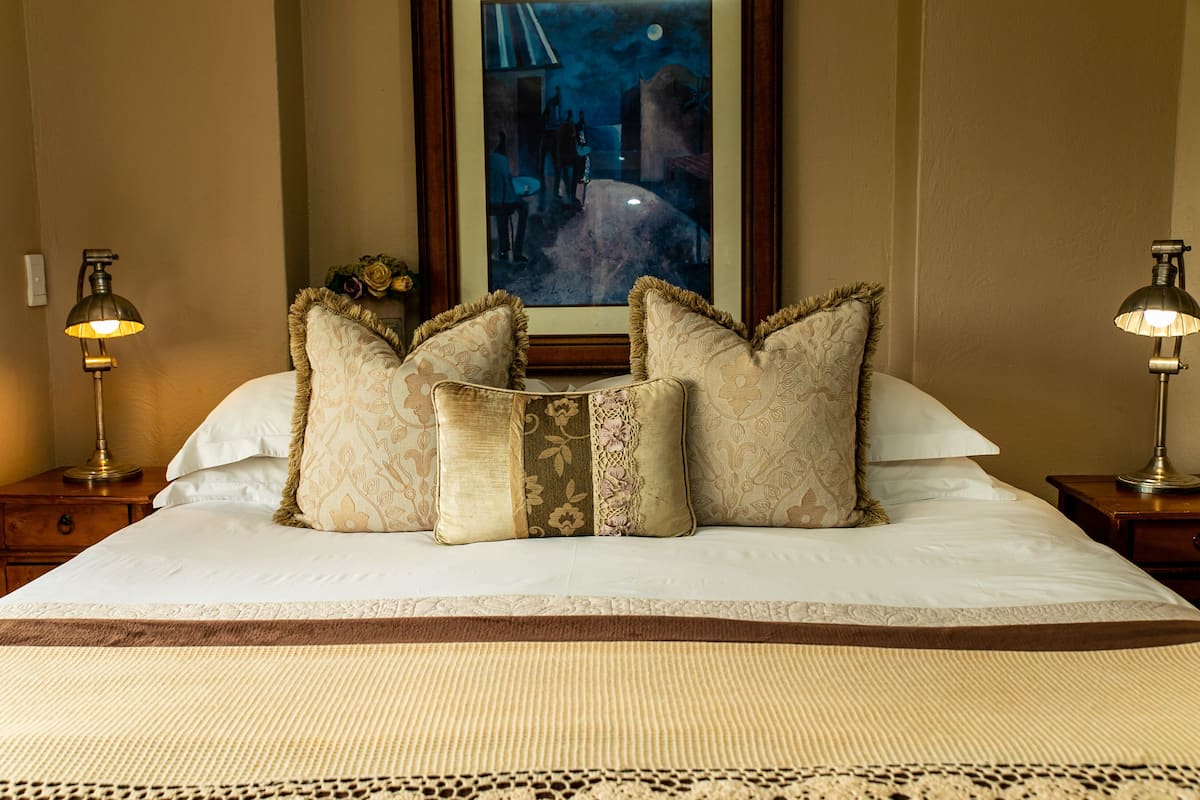 Suíte superior (Michelangelo Suite) | Roupas de cama premium, camas com colchões pillow-top, frigobar