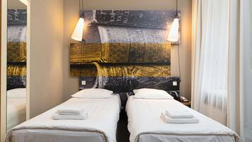 Secretária, quartos insonorizados, ferro/tábua de engomar, Wi-fi grátis