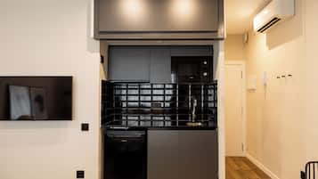 Studio | Cozinha privada | Um frigorífico, um micro-ondas, uma placa de cozinha