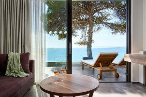 Suíte júnior, banheira de hidromassagem, de frente para o mar (Seafront) | Área de estar