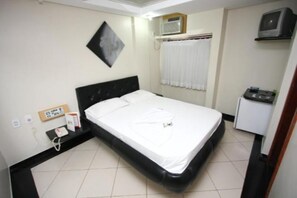 Cortinas blackout, Wi-Fi de cortesia, roupa de cama