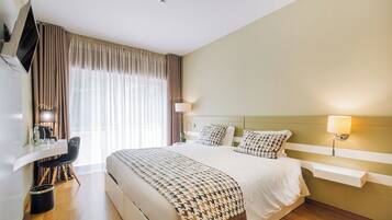 Quarto Duplo ou Twin Deluxe, varanda | Roupa de alta qualidade, edredões de penas