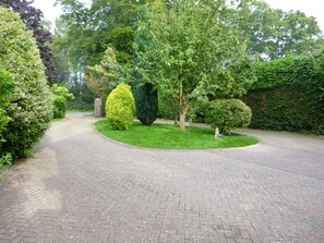 Suíte família | Vista para o jardim