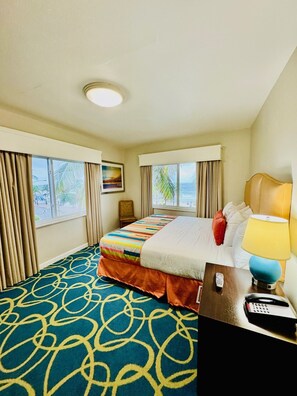 Suíte, 2 quartos | Cofres nos quartos, ferros/tábuas de passar roupa, roupa de cama