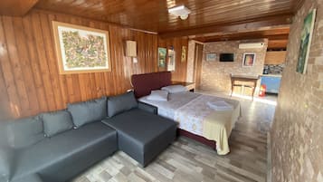 Estúdio superior | Área de estar | TV LCD