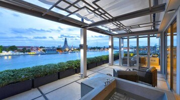 Suíte premium, banheira de hidromassagem, vista para o rio | Vista do quarto