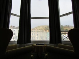 Quarto casal | Área de estar | TV de tela plana