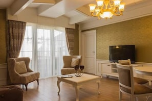 Quarto família, vista para o mar | Área de estar | TV de plasma