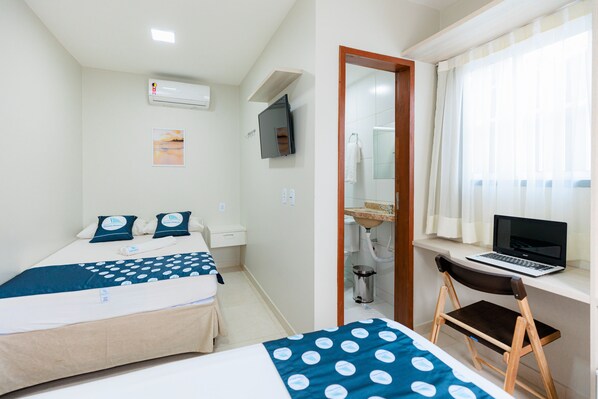 Quarto triplo superior | 1 quarto, camas com colchões pillow-top, frigobar