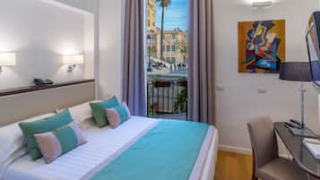 Quarto Duplo Deluxe, varanda, Vista para a cidade | 1 quarto, roupa de alta qualidade, minibar