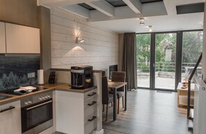 Maisonette Apartment - 07 | Sala de estar | TV de ecrã plano, consola de videojogos, leitor de DVD 